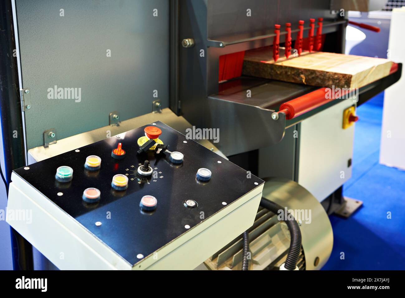 Log sawing machine, wood processing machine Stock Photo - Alamy