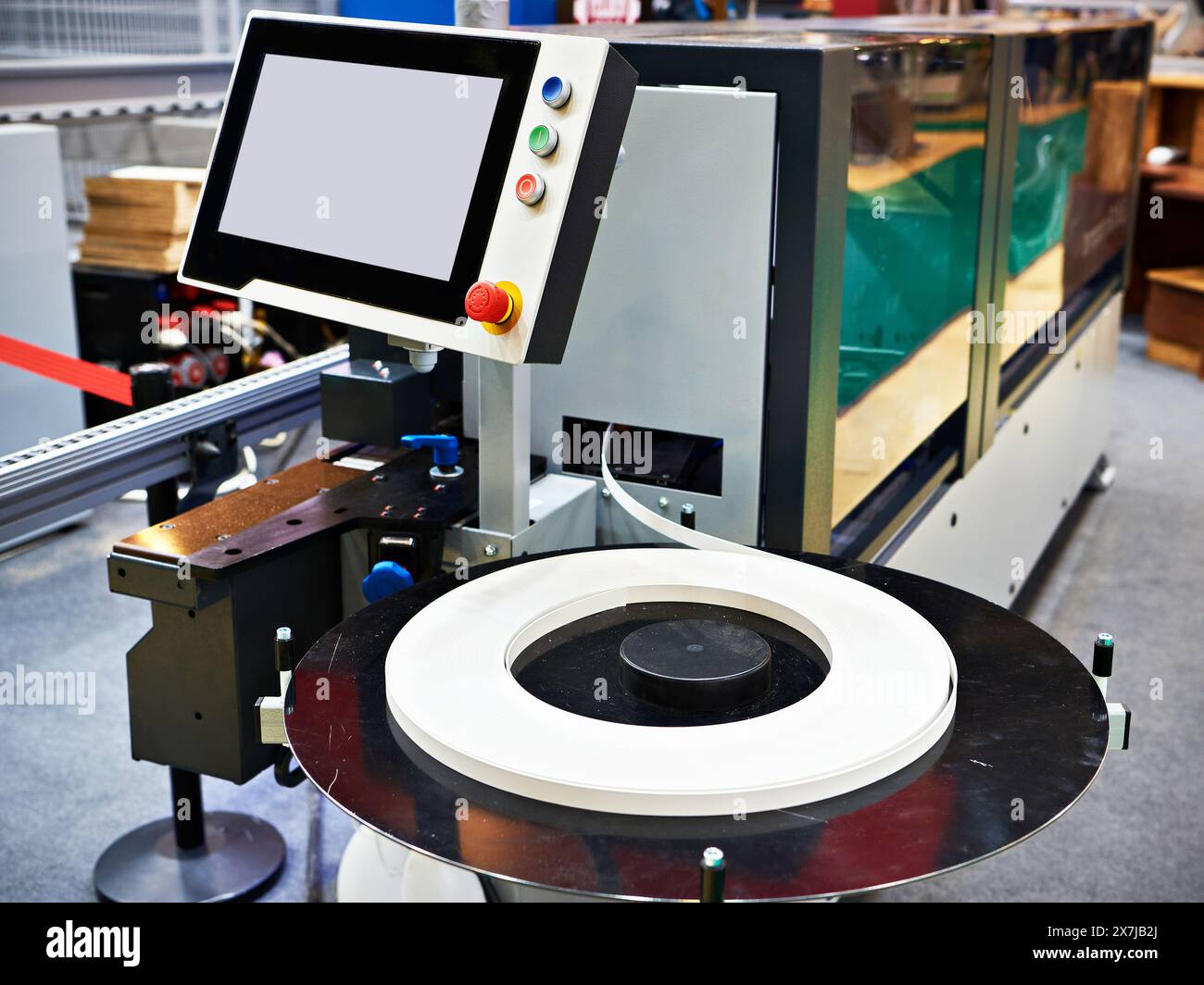 Single sided automatic edge banders on factory Stock Photo - Alamy