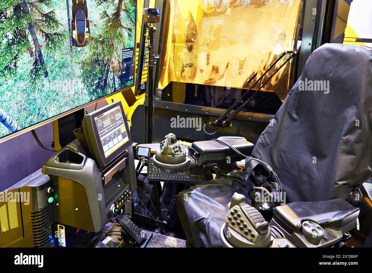 Forest harvester simulator trainer Stock Photo - Alamy