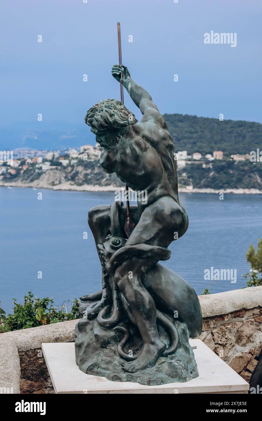 Saint Jean Cap Ferrat, France - 1 June 2023: Poseidon statue aside the ...