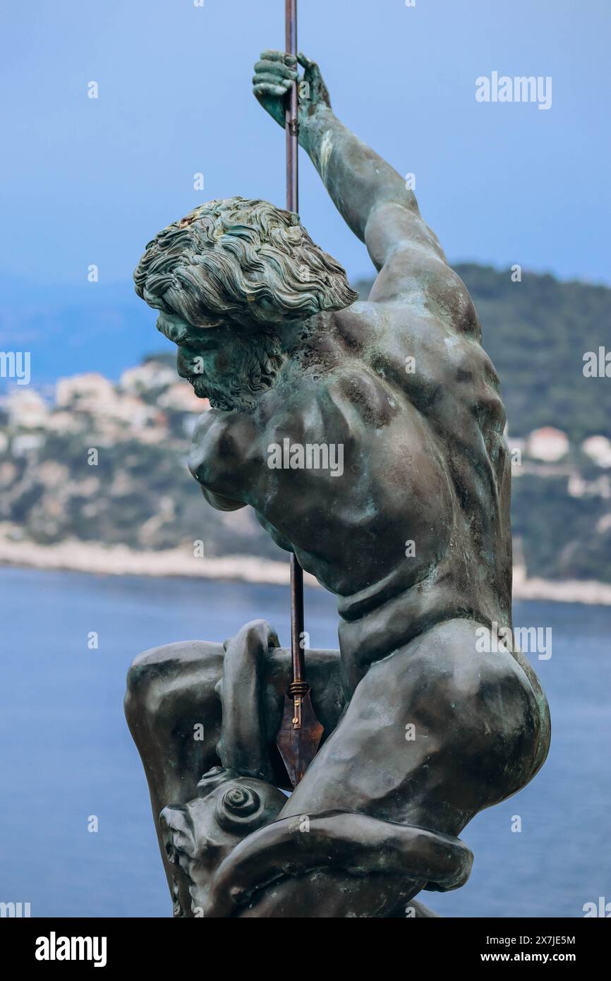 Saint Jean Cap Ferrat, France - 1 June 2023: Poseidon statue aside the ...