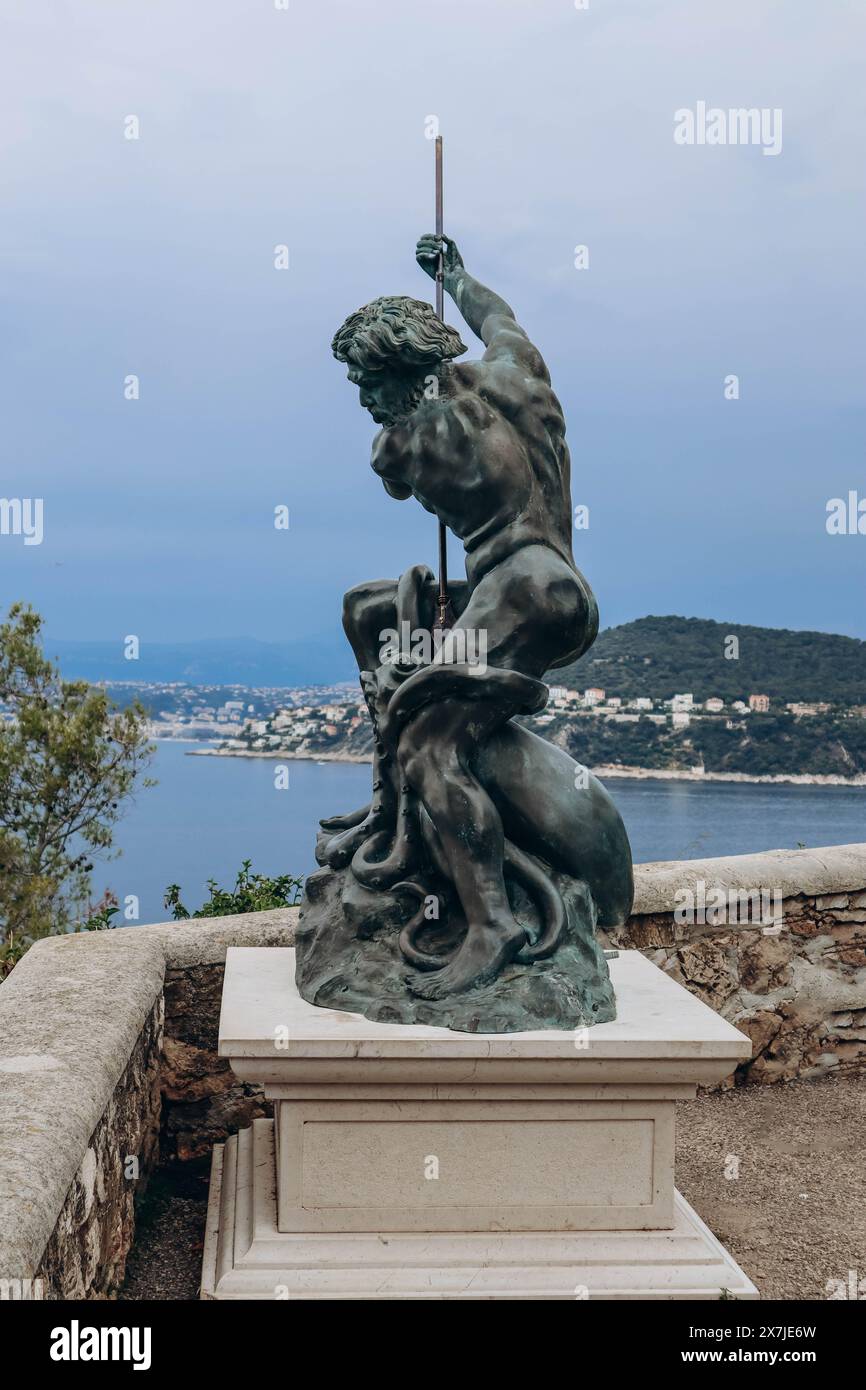 Saint Jean Cap Ferrat, France - 1 June 2023: Poseidon statue aside the ...
