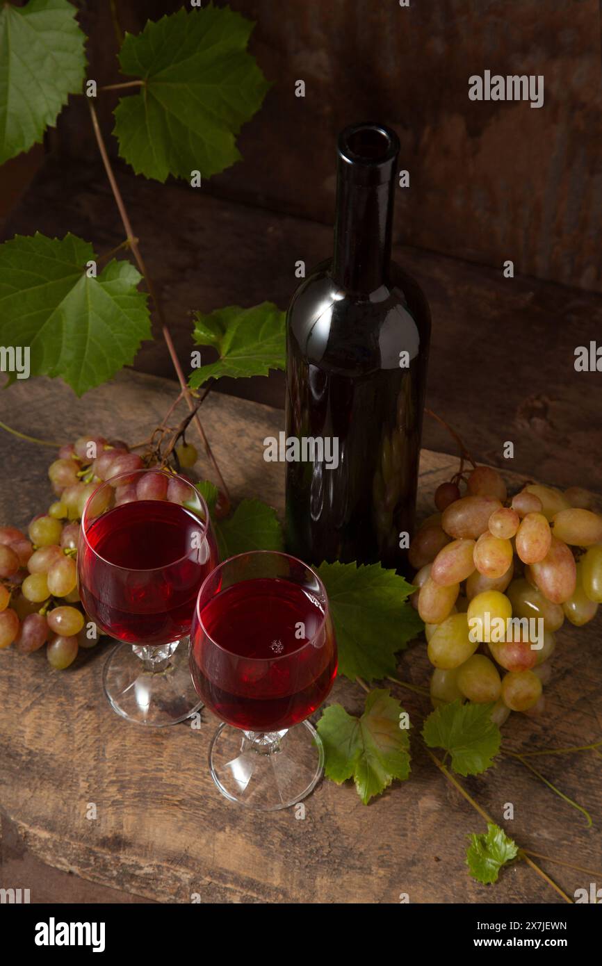 The concept of a delicious alcoholic drink, wine and grapes. Wine ...