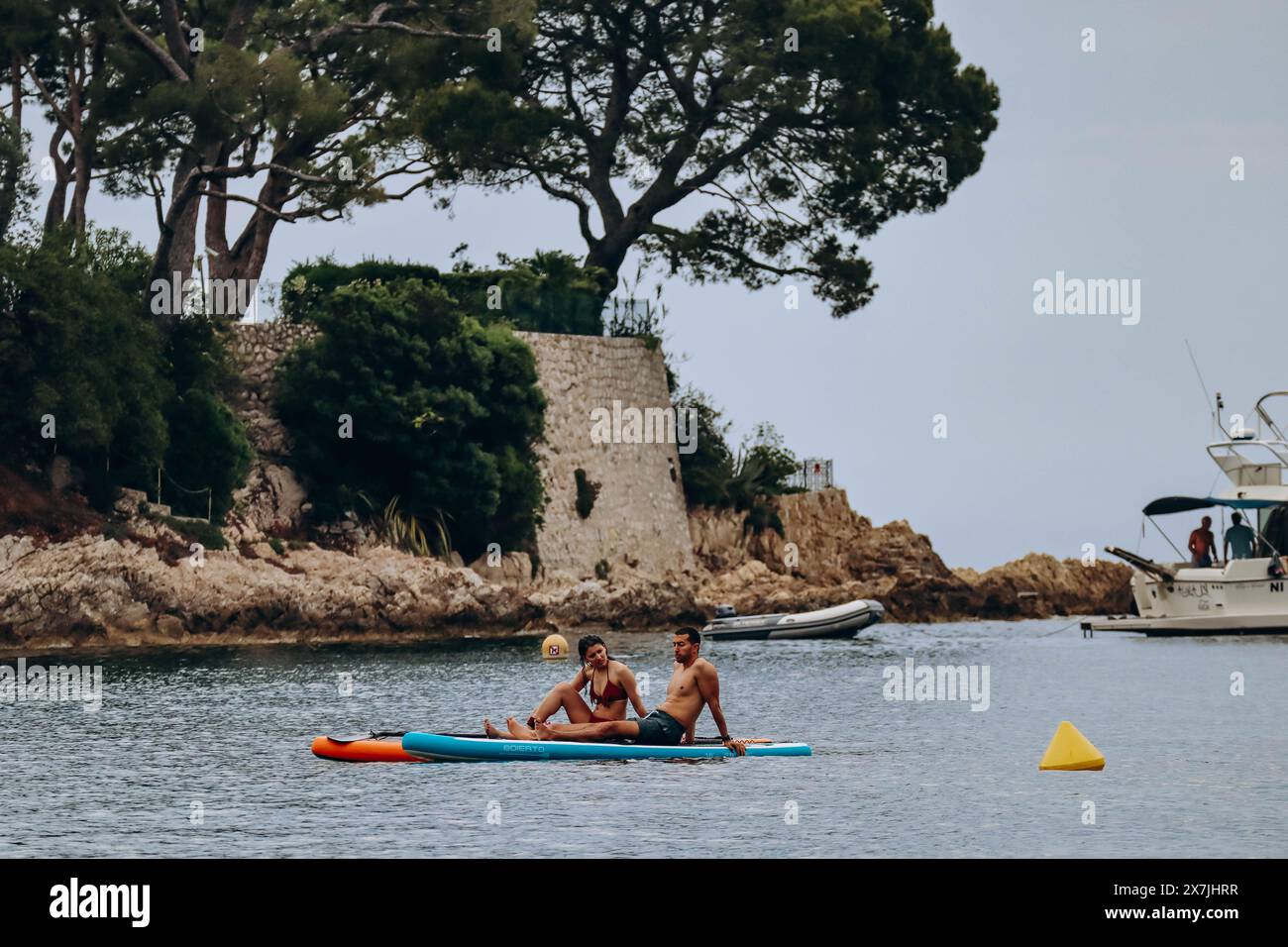 Saint-Jean-Cap-Ferrat, France - 01 June 2023: People are resting on ...