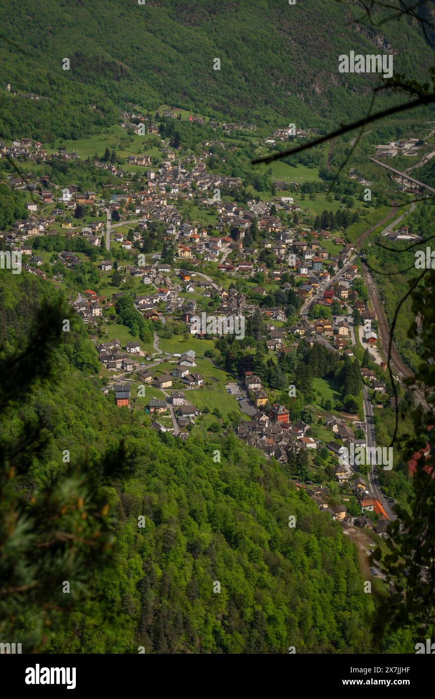 Aerial view for sunny color valley with trees and village Varzo Italy ...