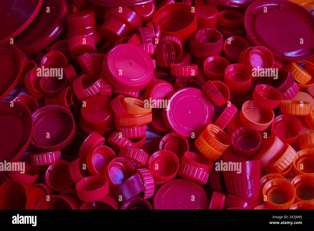 Goiania, Goias, Brazil – April 29, 2024: A pile of red plastic caps ...