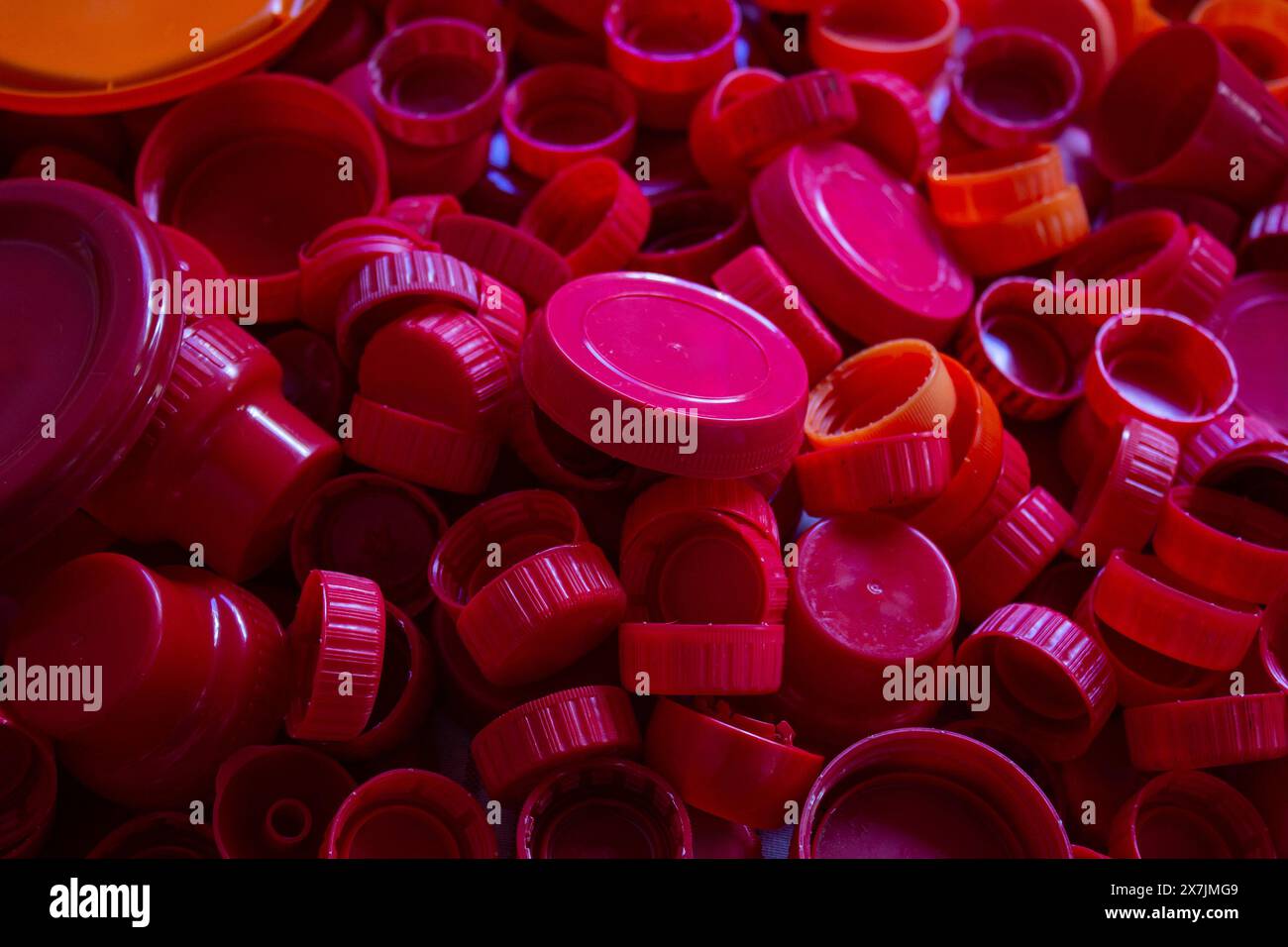 Goiania, Goias, Brazil – April 29, 2024: A pile of red plastic caps ...