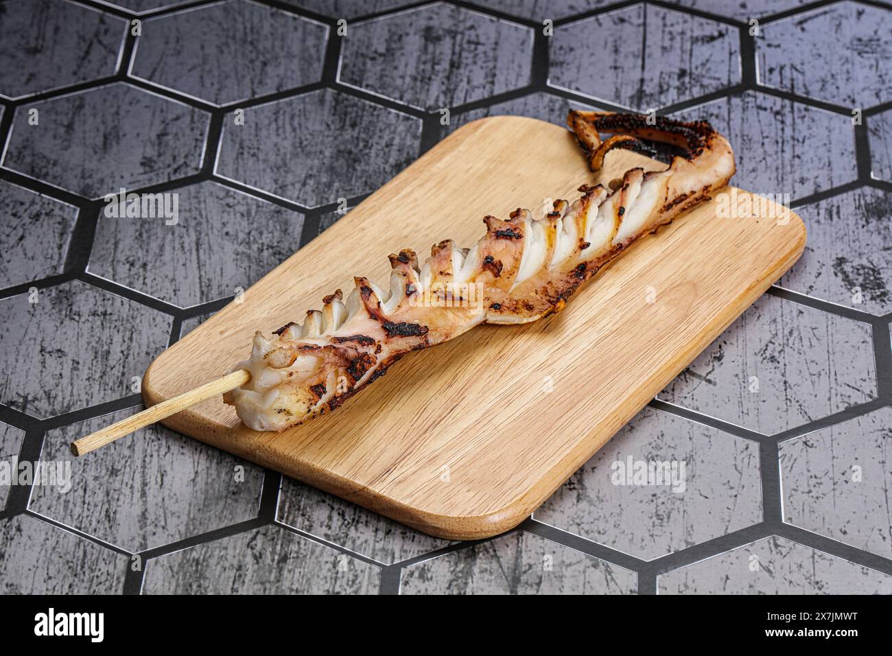 Delicous tasty Grilled octopus tentacle snack Stock Photo - Alamy