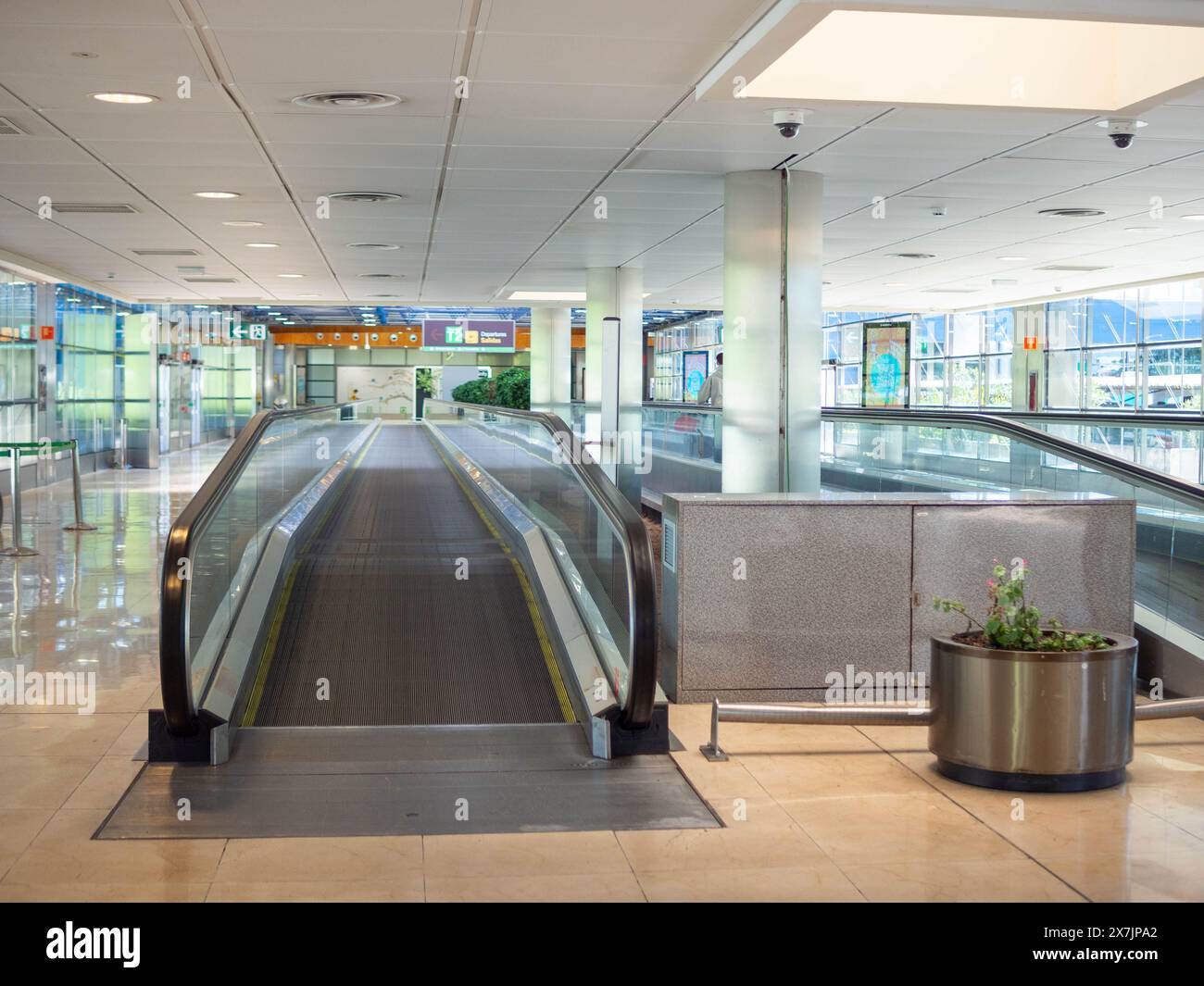 moving walkways inside an airport Stock Photo - Alamy