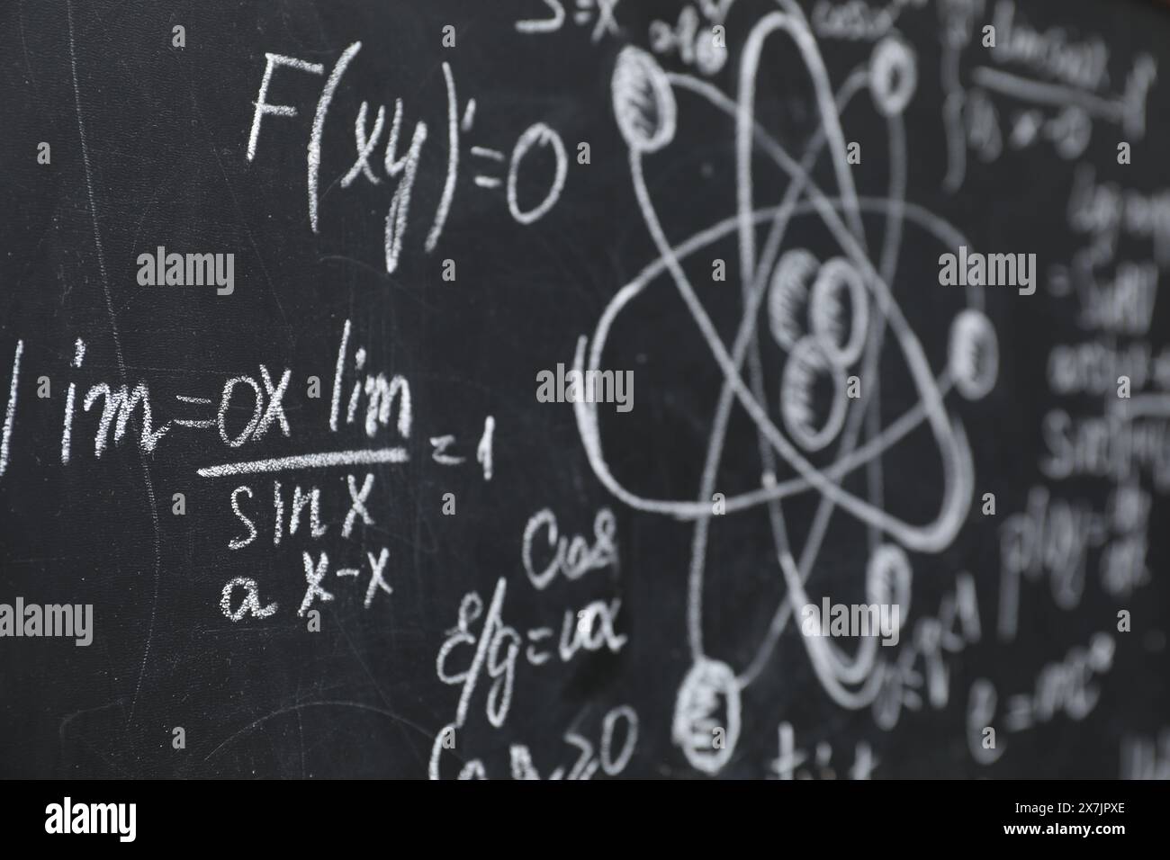 Physical mathematical formulas on blackboard hi-res stock photography ...
