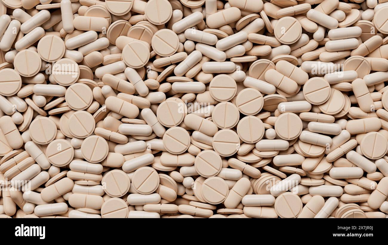 Beige tablets fill the screen, pills background . Drugs, pills, tablets ...
