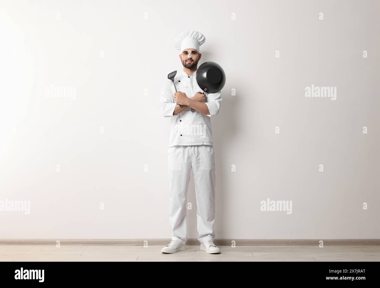 Professional chef wok spatula hi-res stock photography and images - Alamy