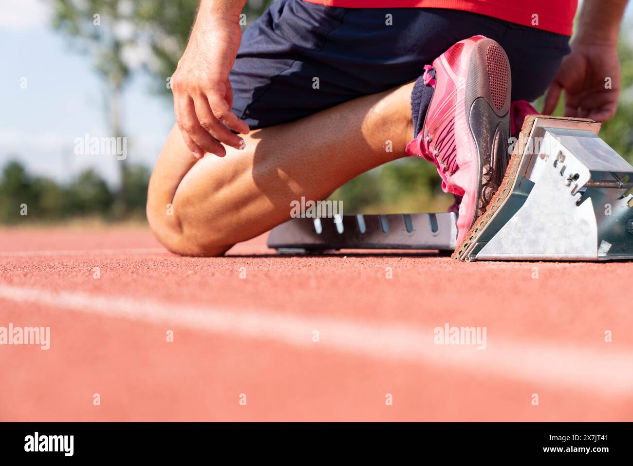 Stadium, man running and start block of athlete on a runner and arena ...