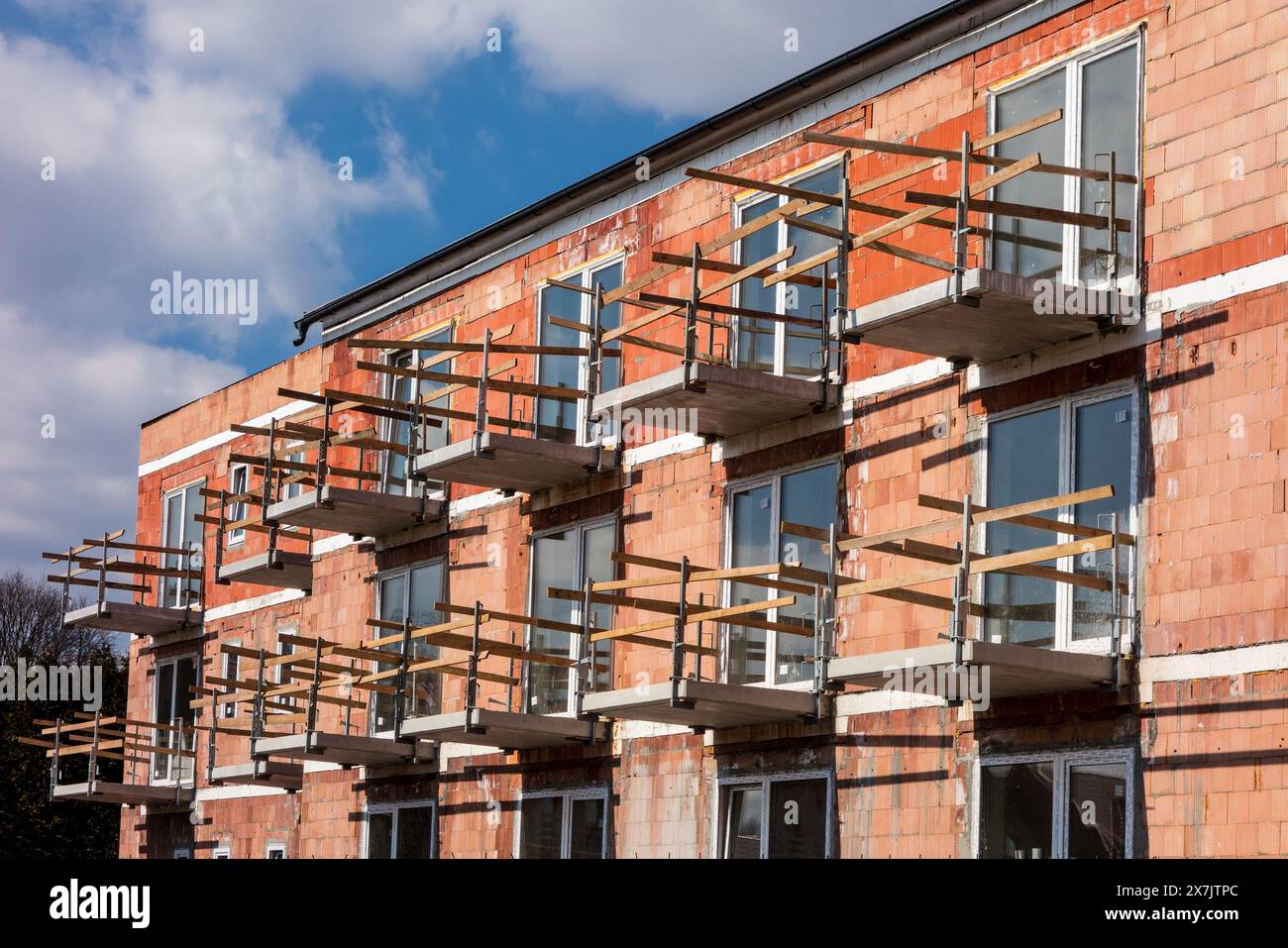 Construction zone of modern apartments built using red bricks Stock ...