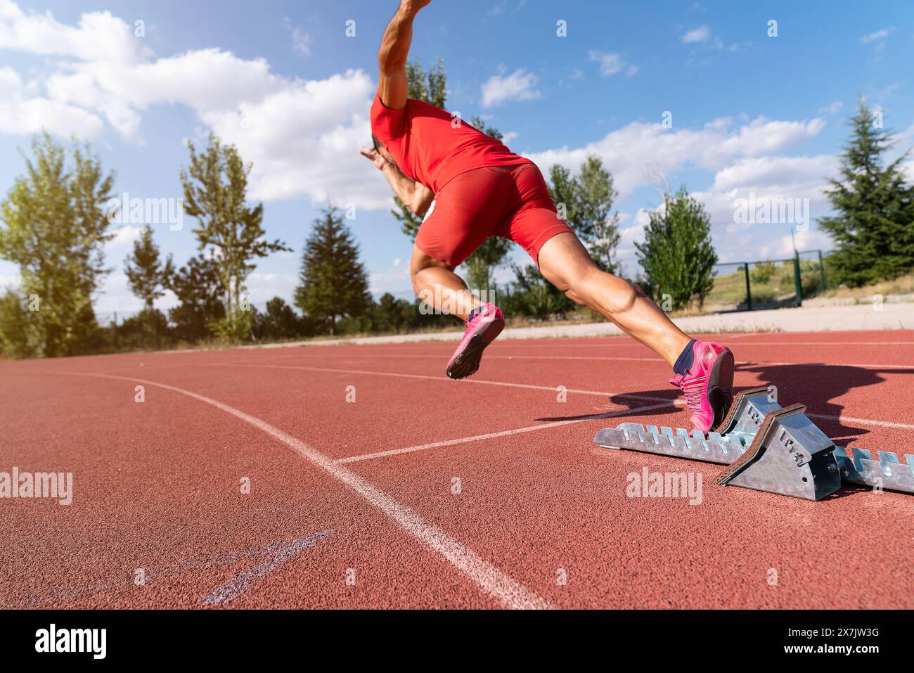 Stadium, man running and start block of athlete on a runner and arena ...