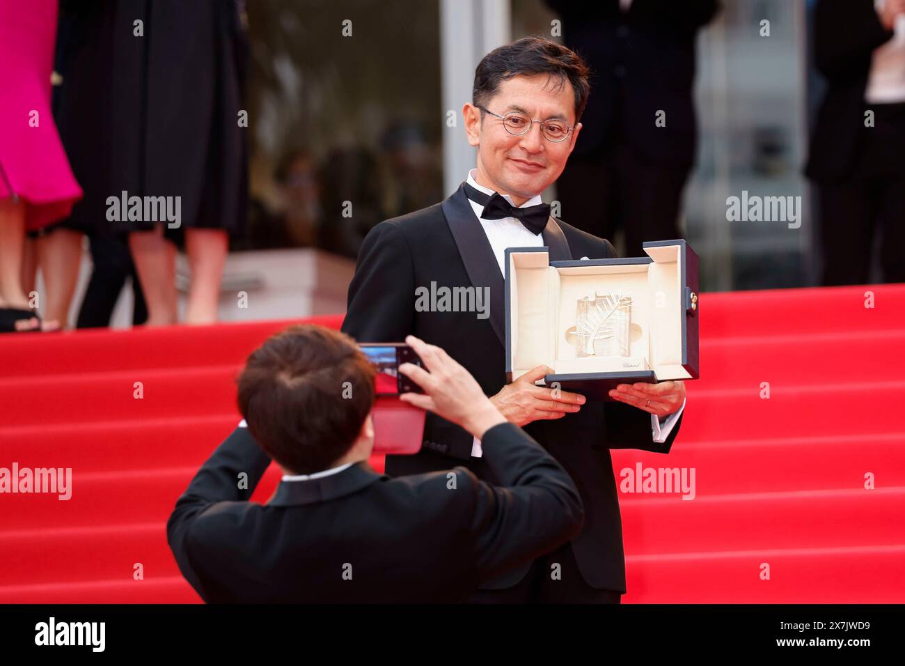 Goro Miyazaki and Kenichi Yoda pose with the Golden Palm for Studio ...