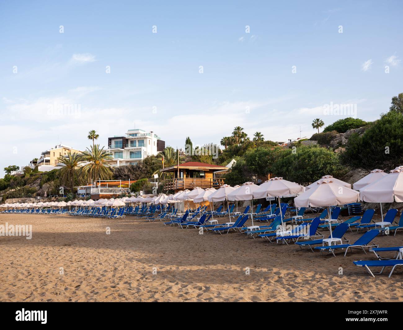 May 2024 - Rows of beach umbrellas and sunbeds near Pafos, Cyprus Stock ...