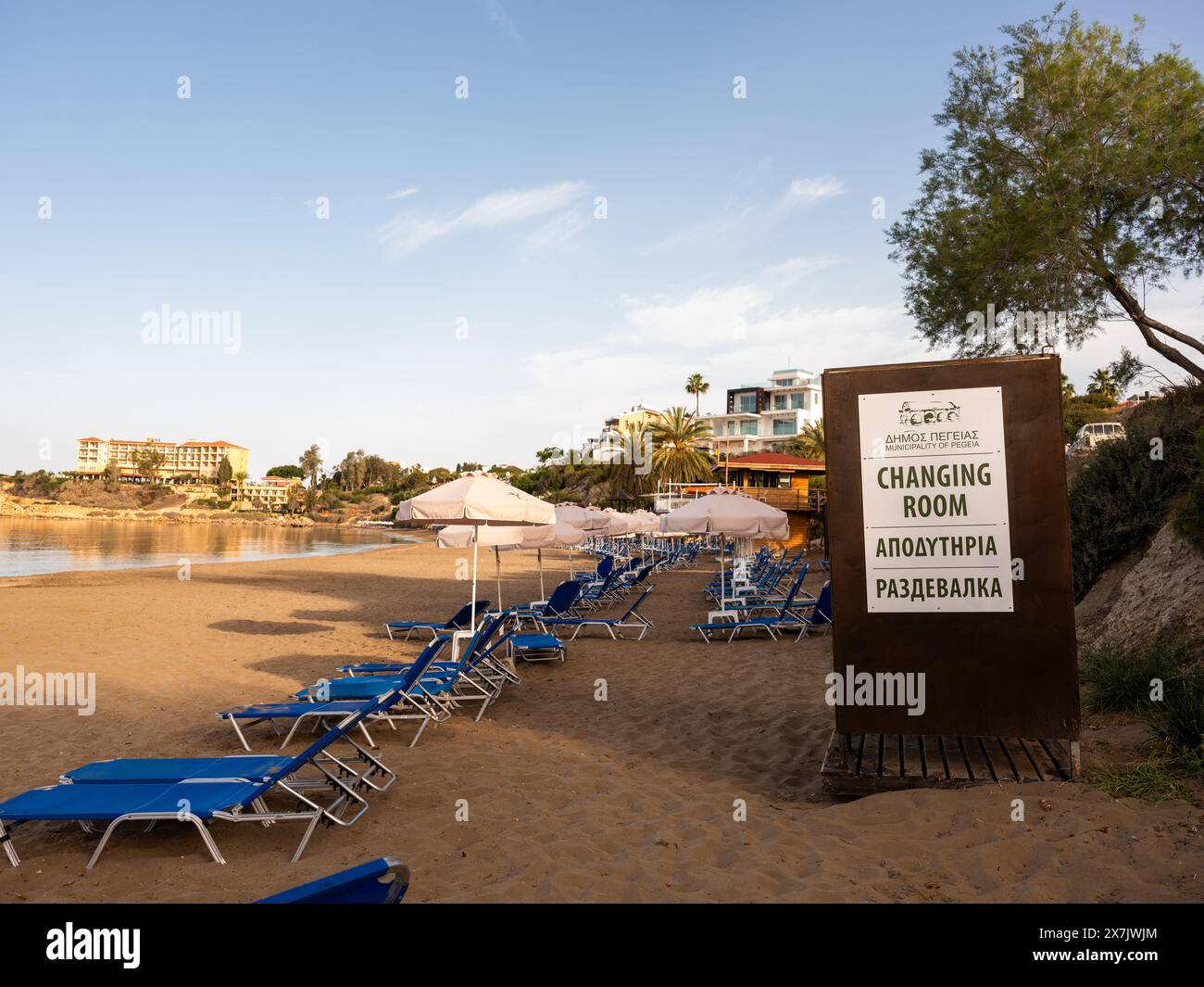 May 2024 - Rows of beach umbrellas and sunbeds near Pafos, Cyprus Stock ...