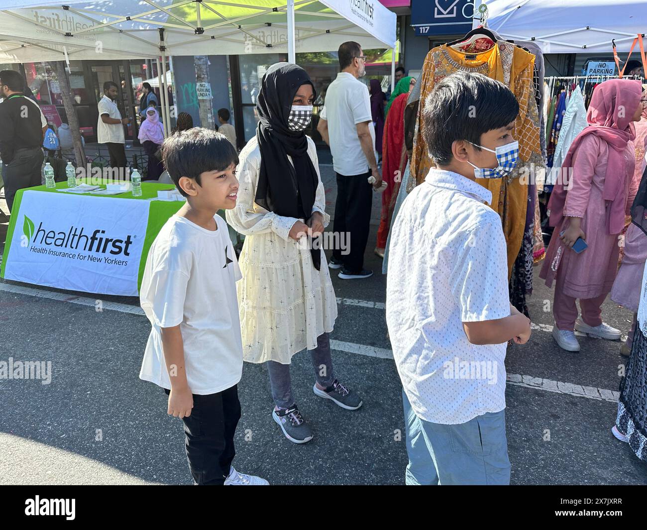 Children wear face masks at Bangladeshi street fair in the Kensington ...