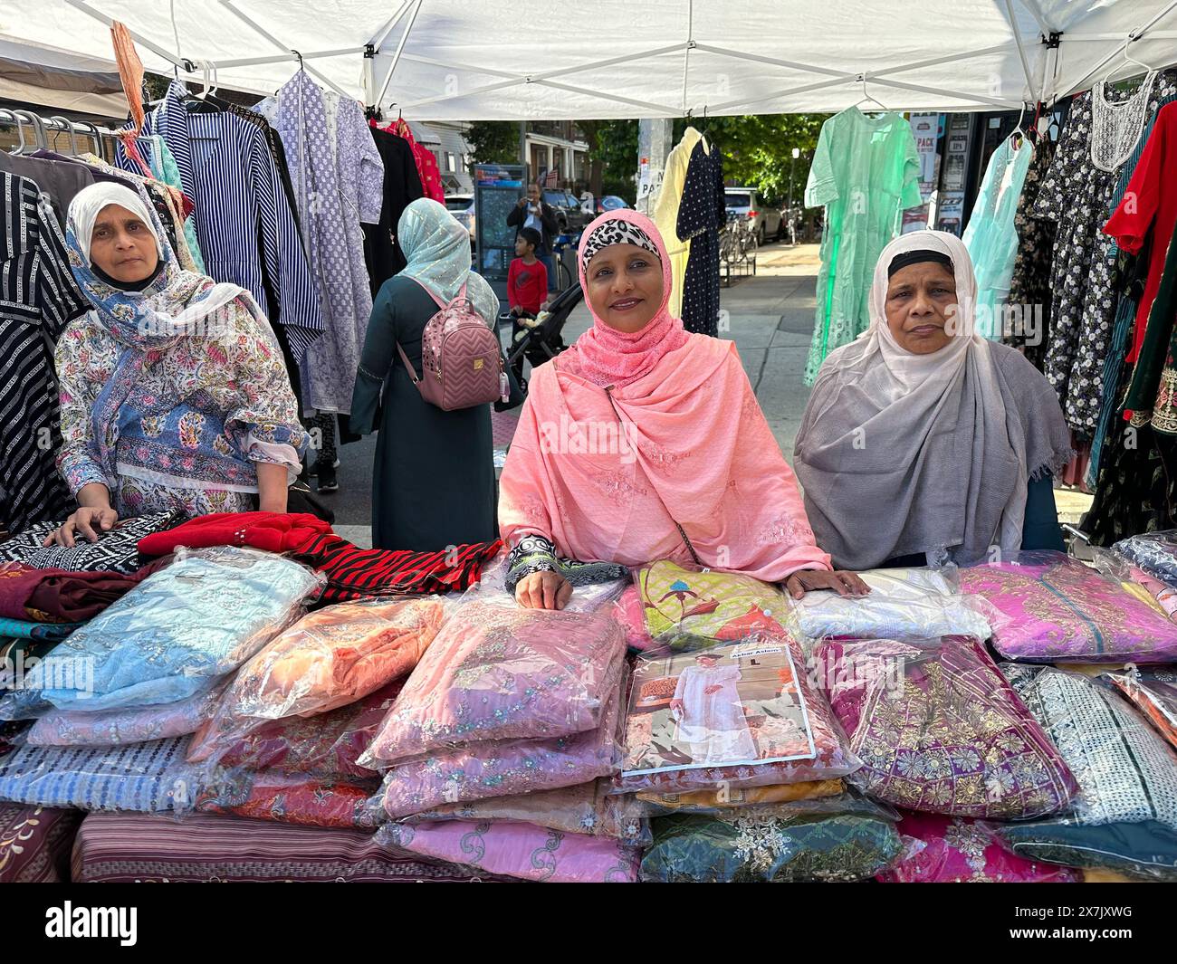 Women selling clothes at Bangladeshi street fair in the Kensington ...