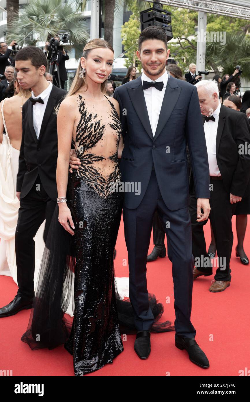 Cannes, France. 20th May, 2024. Flavy Barla and Esteban Ocon attend The ...