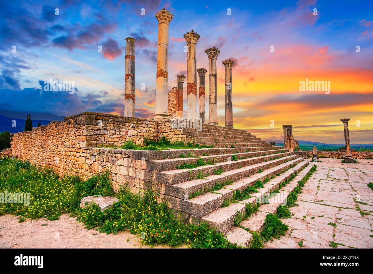Volubilis, Morocco: Capitoline temple in the sunset lights. Historical ...