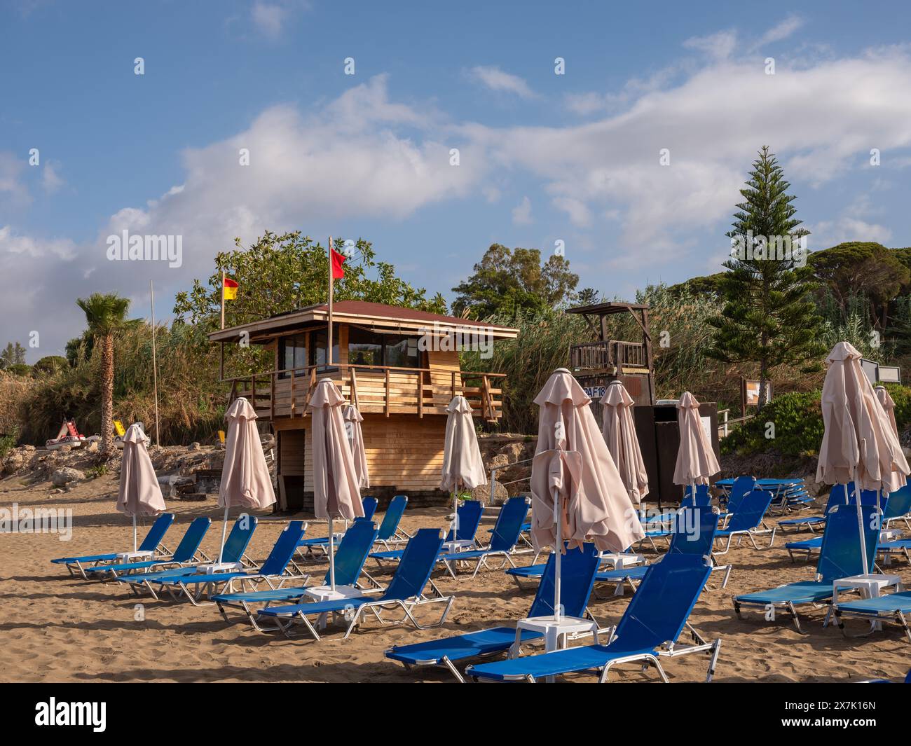May 2024 - Rows of beach umbrellas and sunbeds near Pafos, Cyprus Stock ...