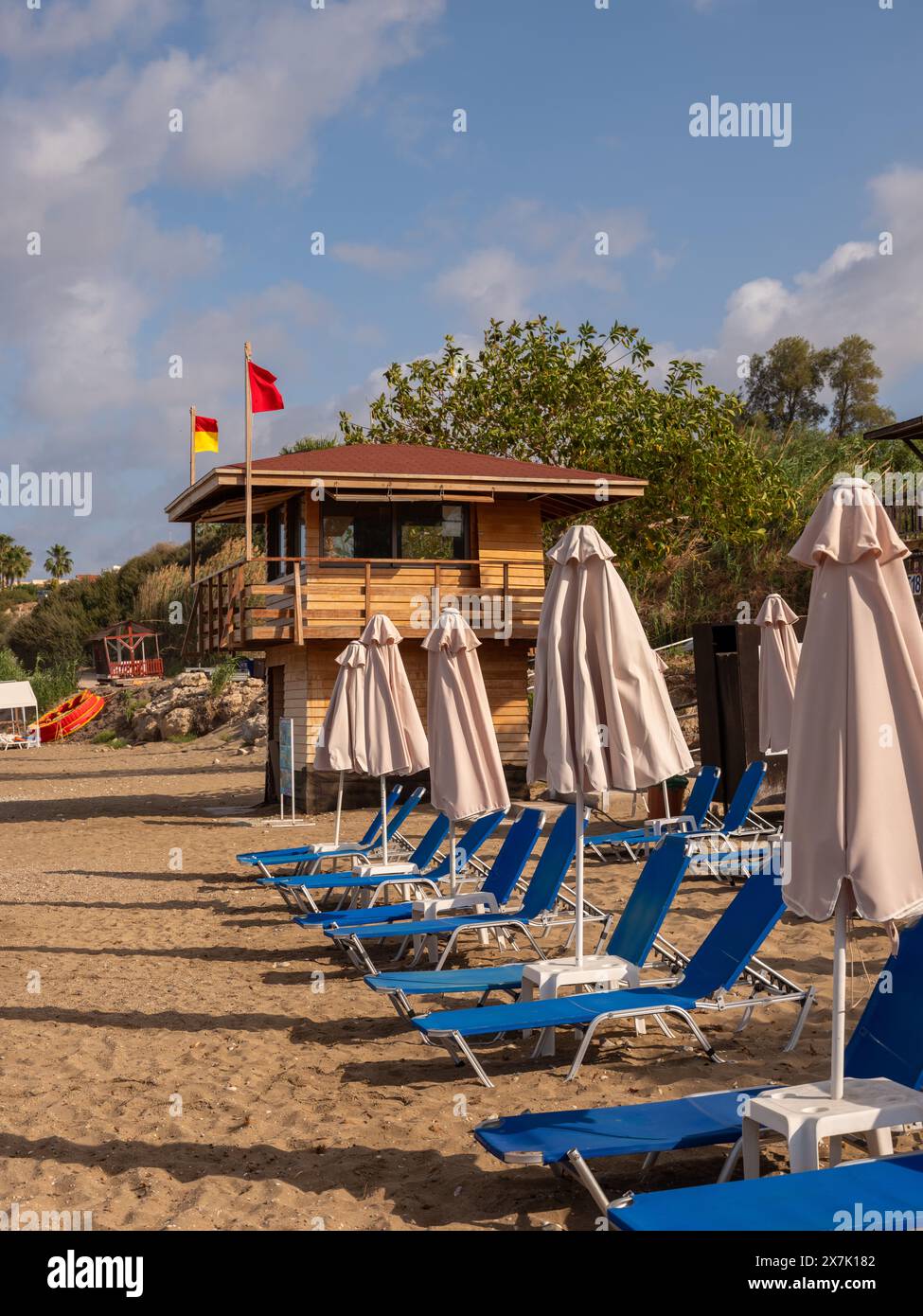 May 2024 - Rows of beach umbrellas and sunbeds near Pafos, Cyprus Stock ...