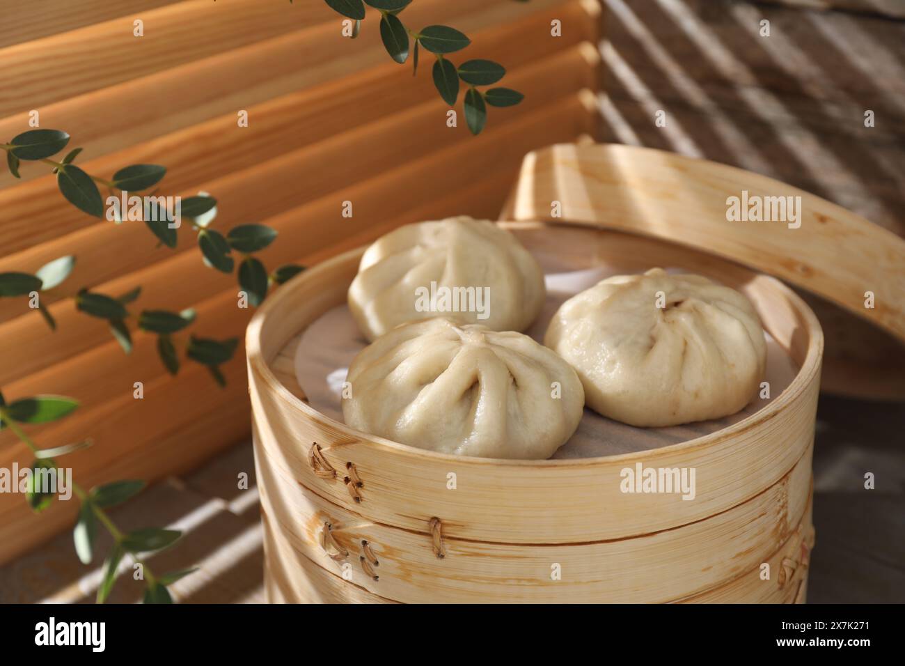 Delicious bao buns (baozi) on table, closeup Stock Photo - Alamy