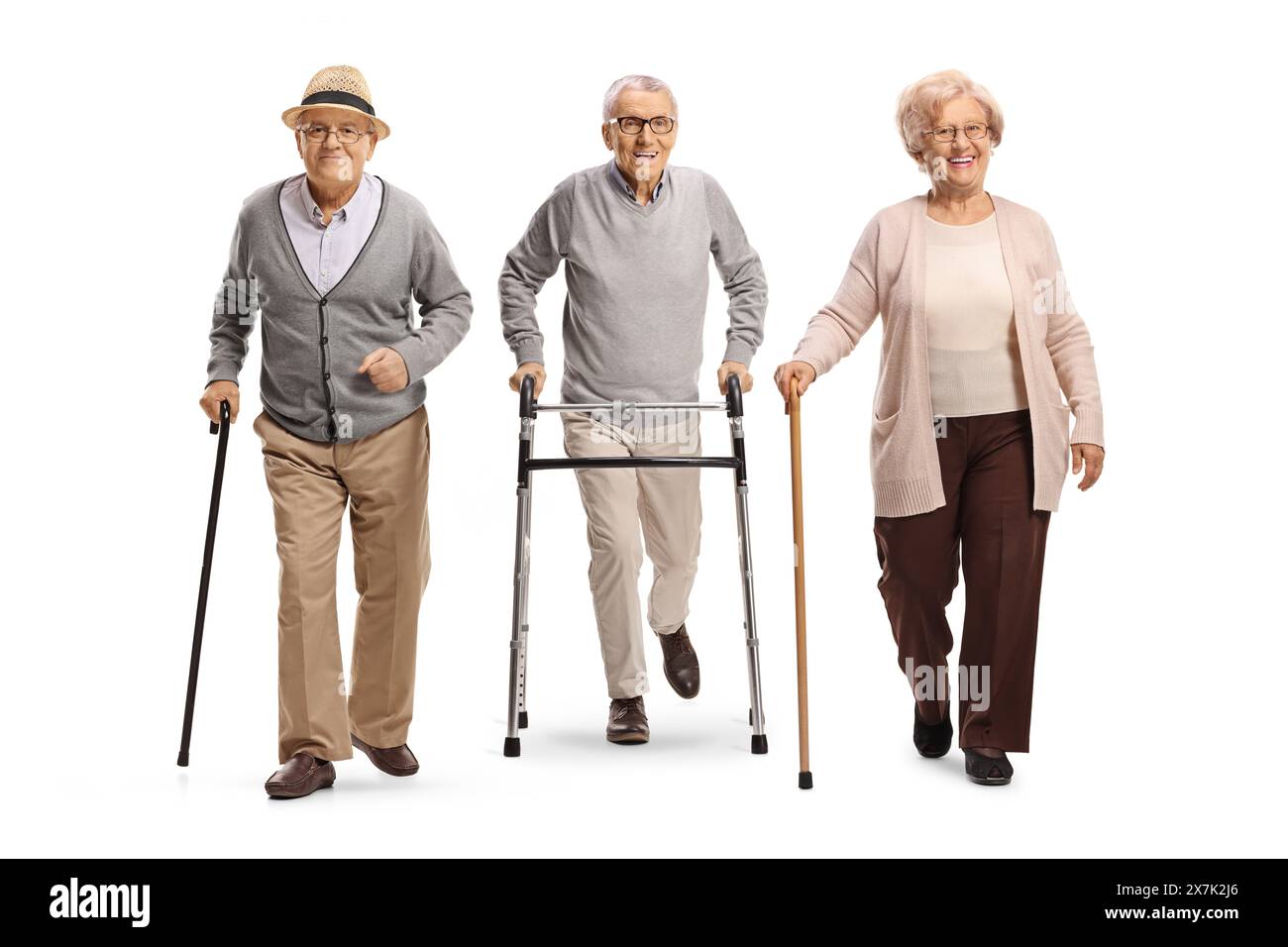 Group of elderly people with a walker and canes isolated on white ...