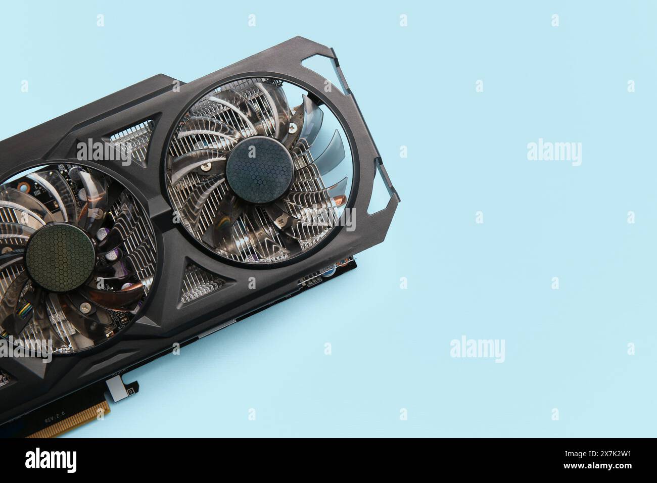 One graphics card on light blue background, top view. Space for text ...