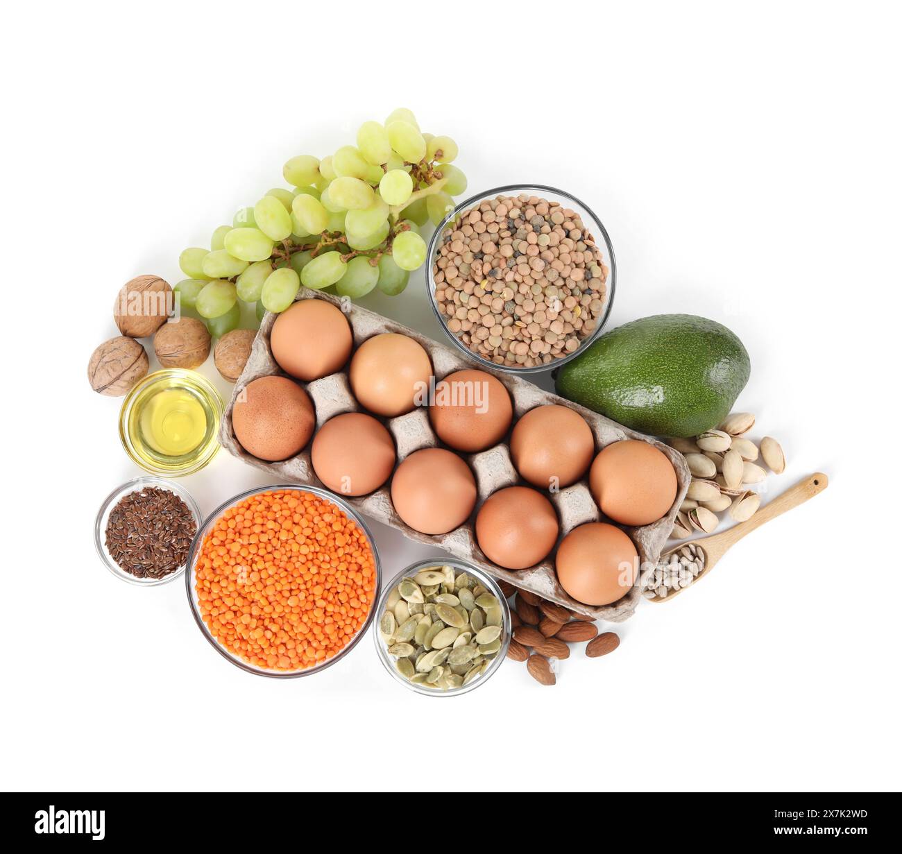 Different nuts, seeds and products high in healthy fats isolated on ...
