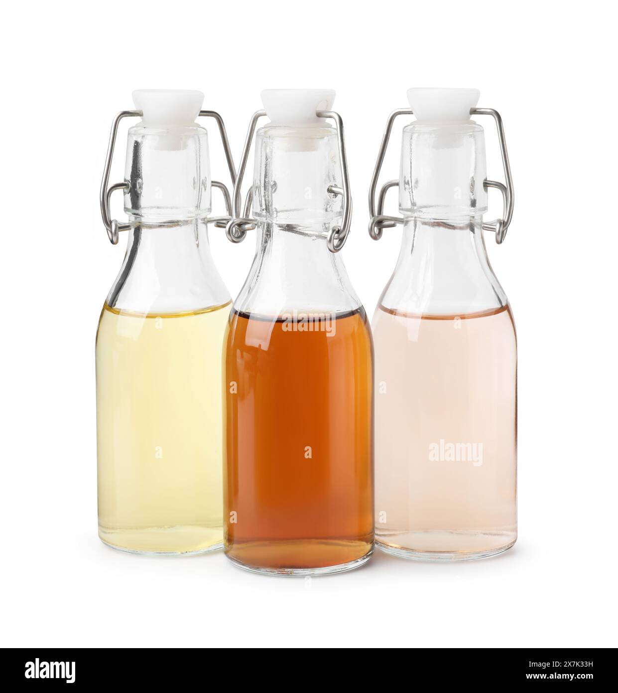 Different types of vinegar in bottles isolated on white Stock Photo - Alamy