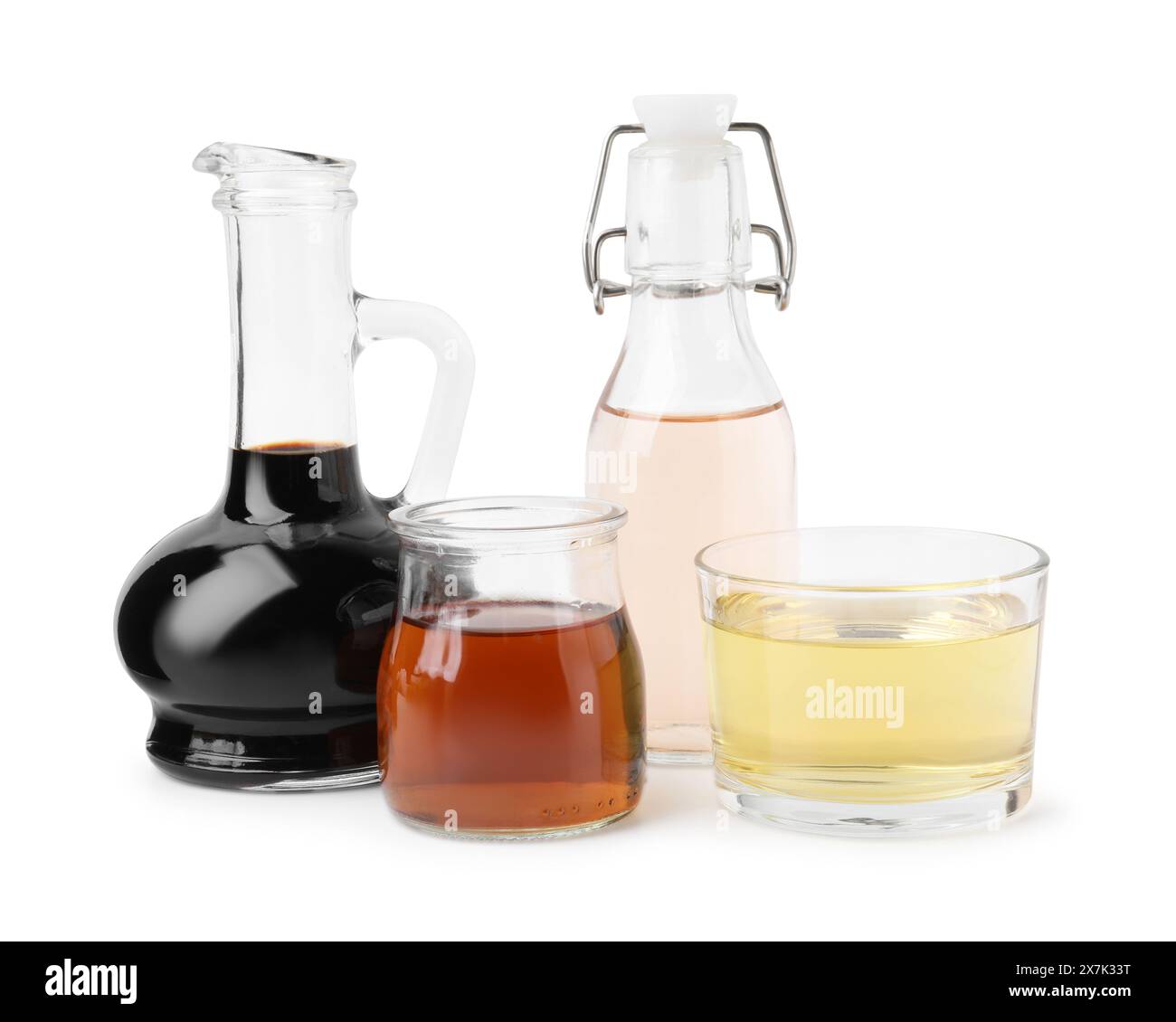 Different types of vinegar isolated on white Stock Photo - Alamy