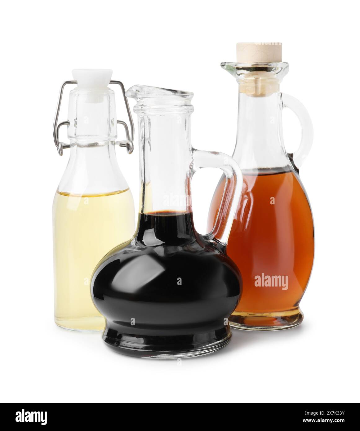 Different types of vinegar isolated on white Stock Photo - Alamy