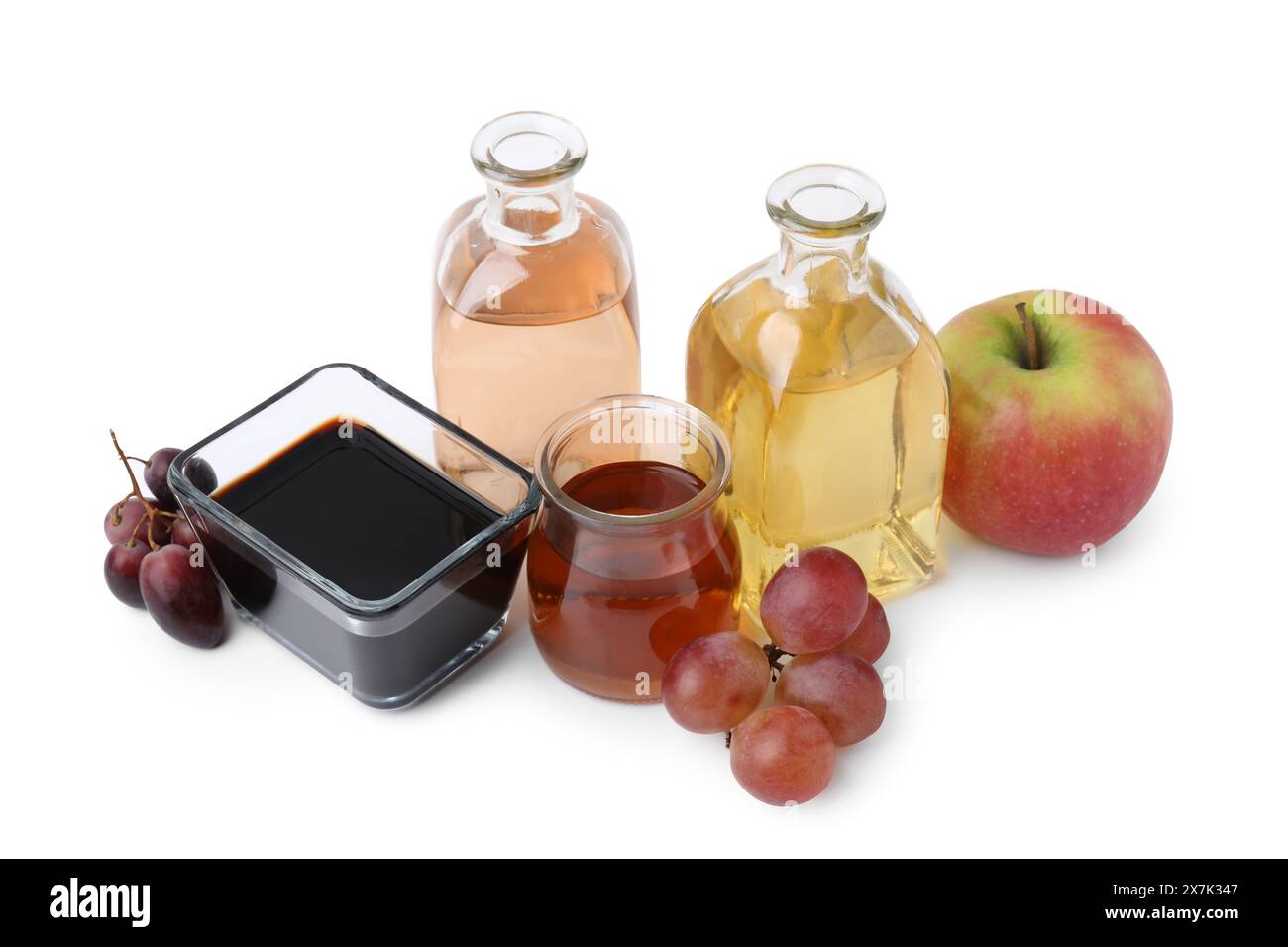Different types of vinegar and ingredients isolated on white Stock ...
