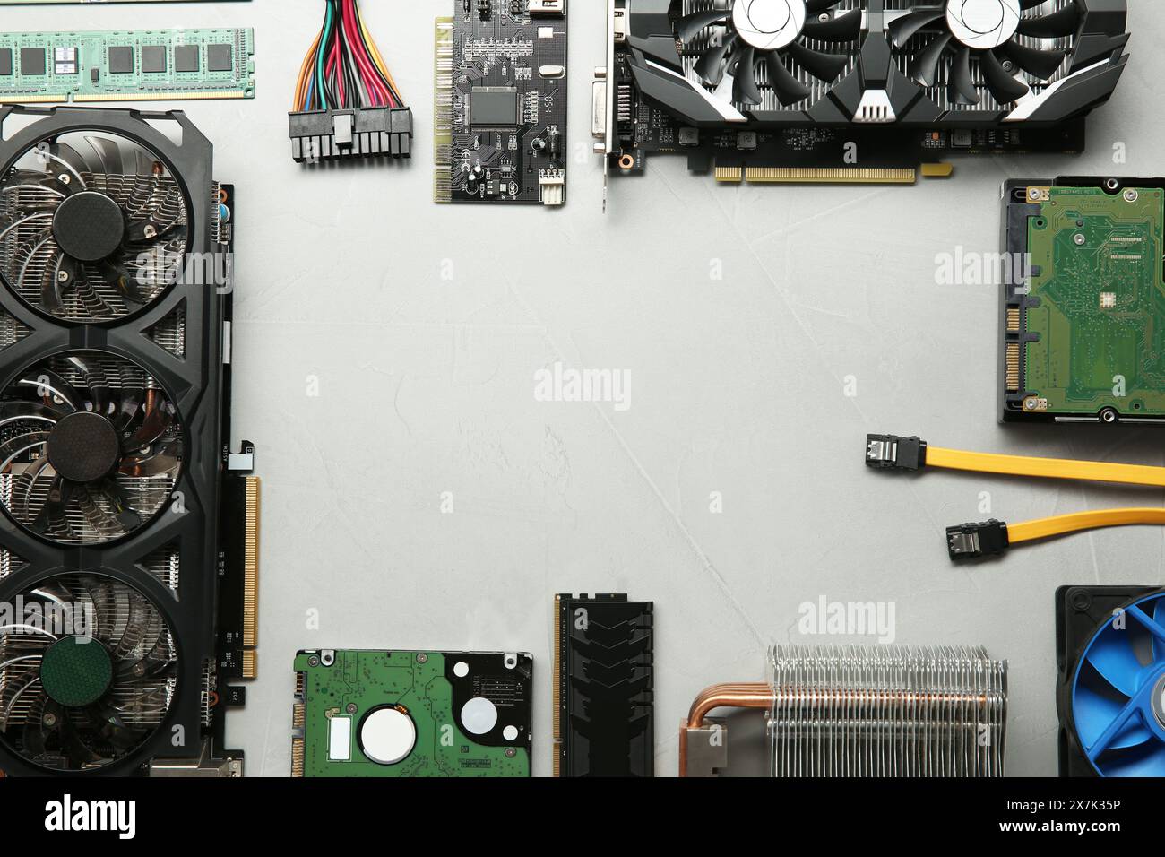 Frame of graphics card and other computer hardware on gray textured ...