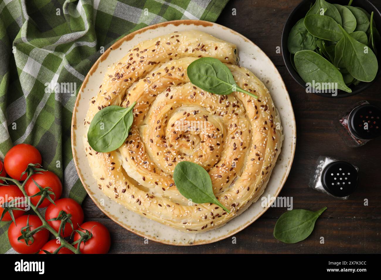 Delicious puff pastry with spinach on wooden table, flat lay Stock ...