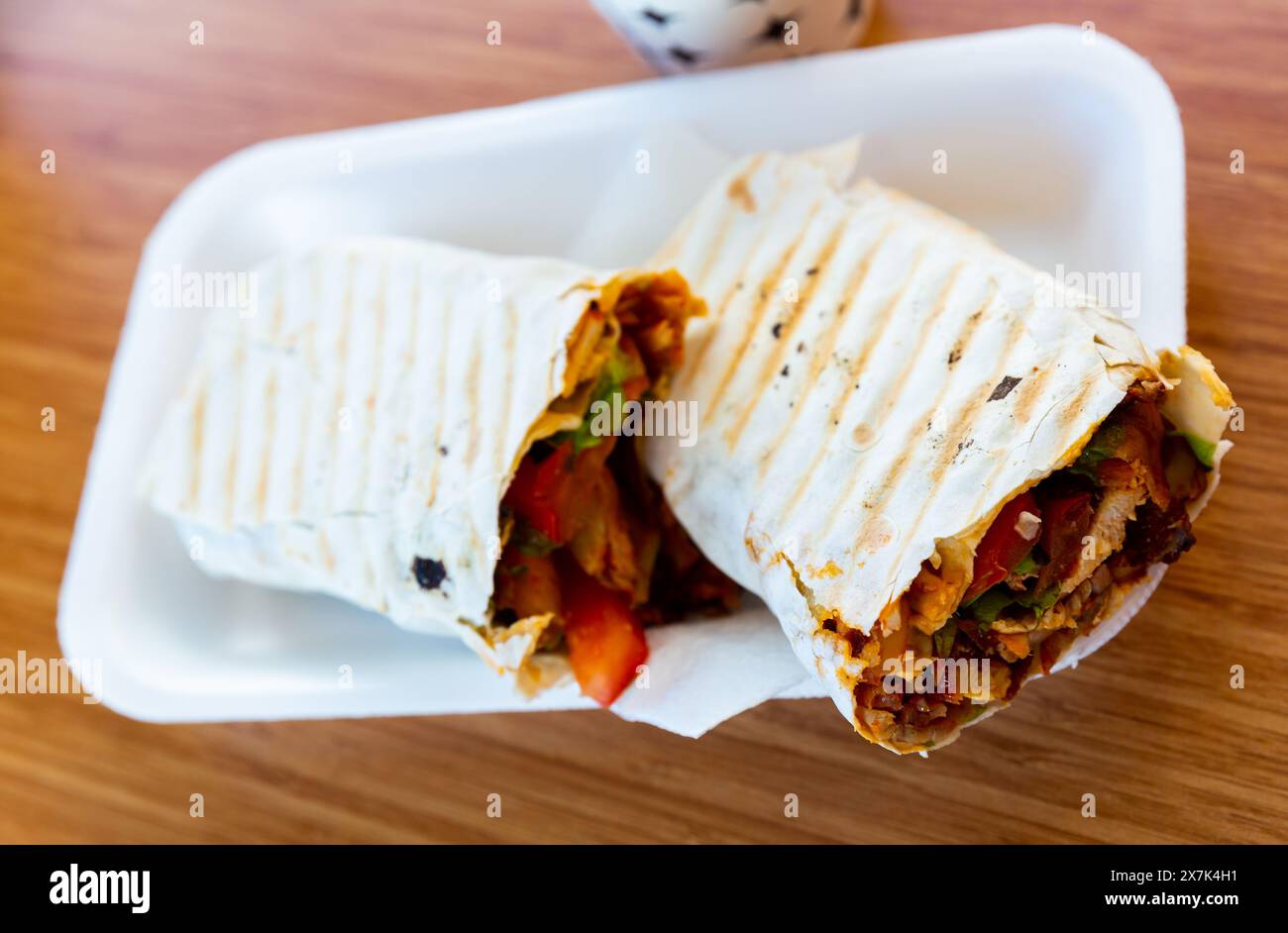 Turkish fast food, wrapped dish durum kebab Stock Photo - Alamy