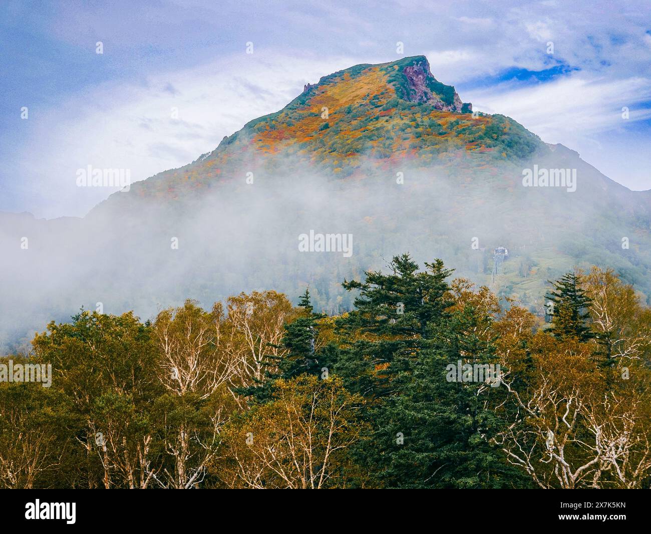 Vibrant colors of Mount Kurodake's summit in early autumn from the ...