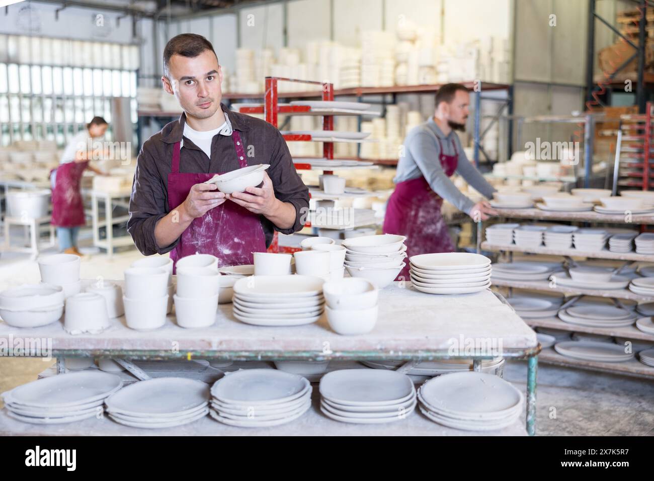 Man clay pottery inspection hi-res stock photography and images - Alamy