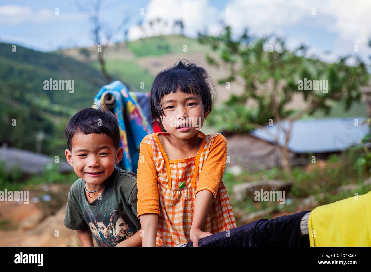 Young Lahu children, boy and girl, in a village near Lanjia Lodge in ...