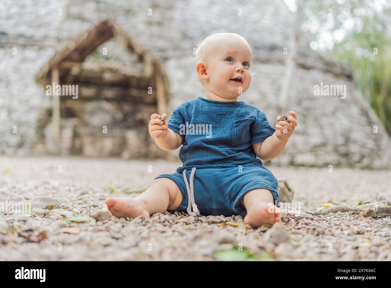 Baby tourist at Coba, Mexico. Ancient mayan city in Mexico. Coba is an ...