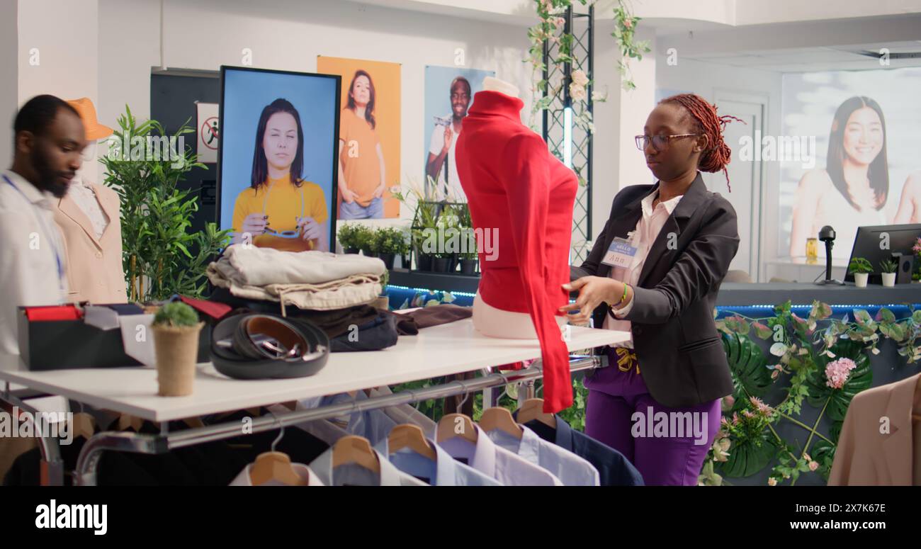 Bipoc employee tidying up hi-res stock photography and images - Alamy