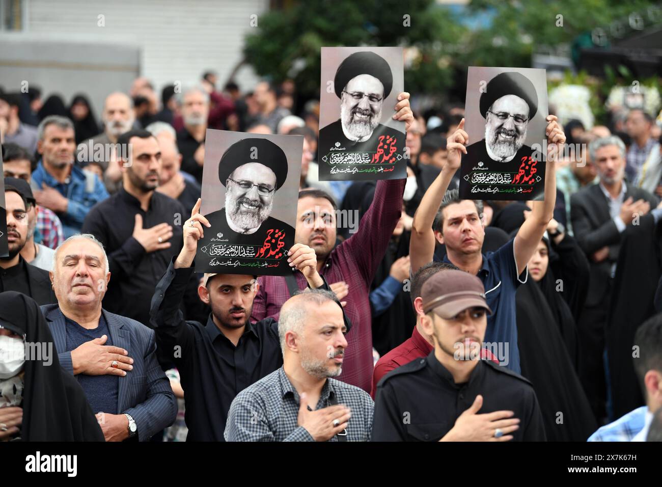 Tehran, Iran. 20th May, 2024. People mourn victims of the helicopter ...