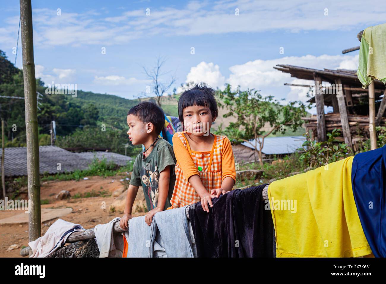 Young Lahu children, boy and girl, in a village near Lanjia Lodge in ...
