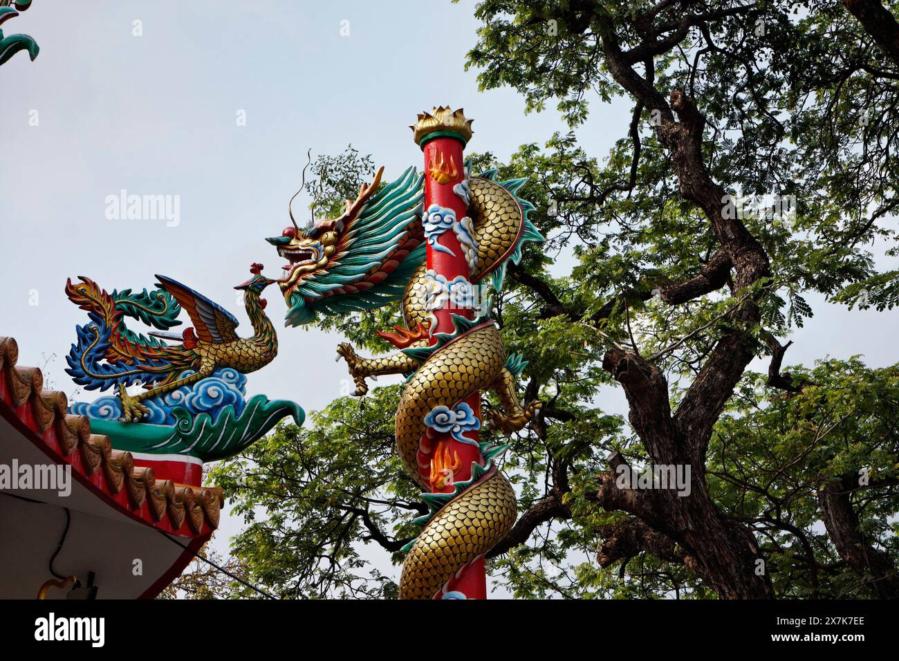 Thailand, Bangkok, a religious dragon statue close to a buddhist temple ...