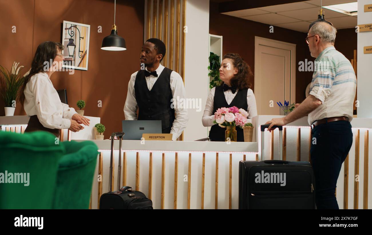 After check in verification, retired people receive room access with ...