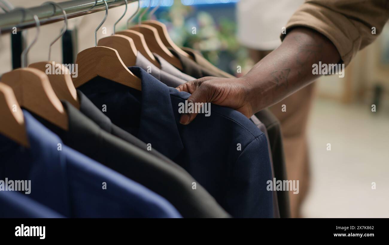 Customer in thrift shop browsing hi-res stock photography and images ...