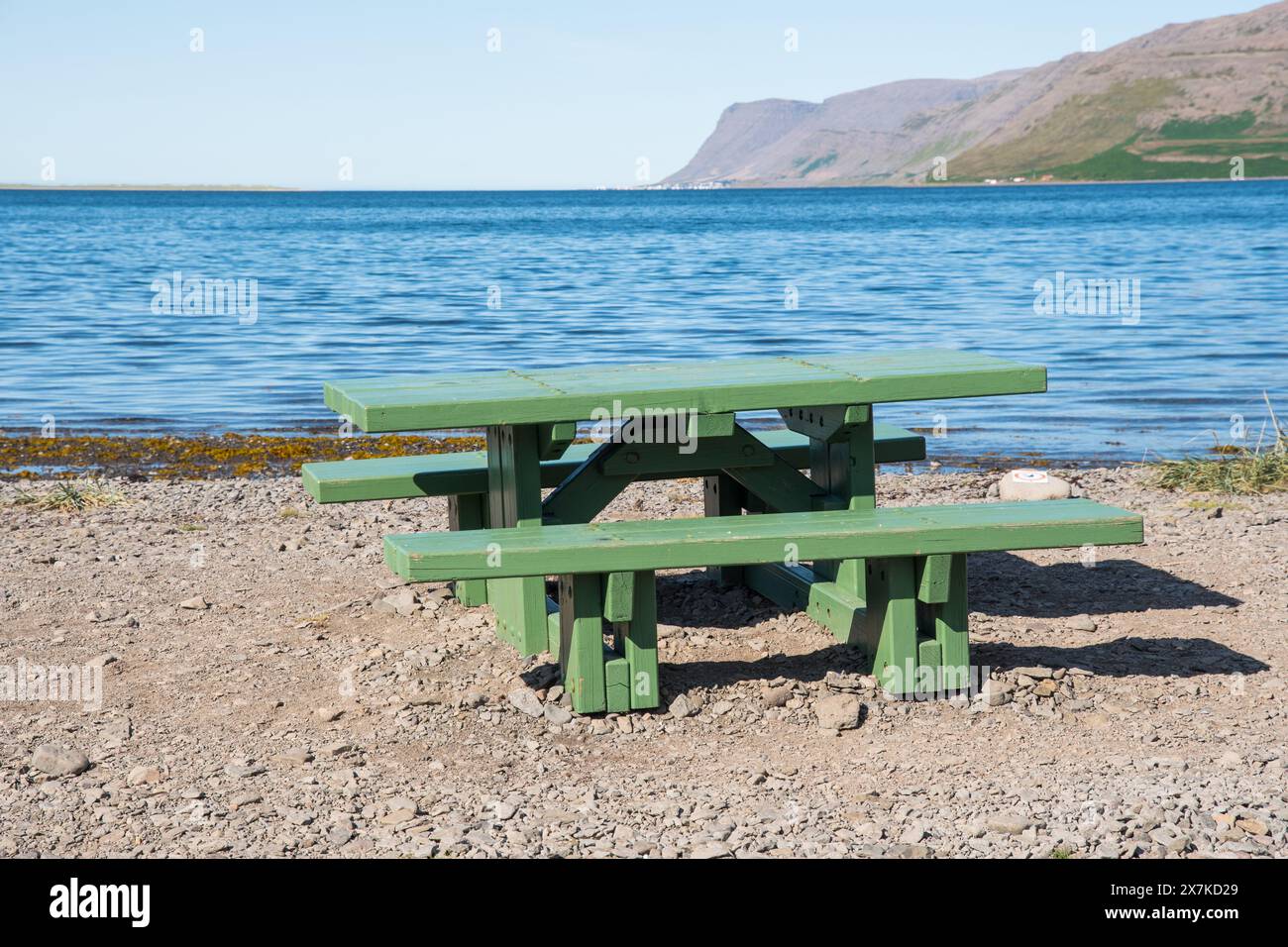 picnic table on the beach of Patreksfjordur in west Iceland Stock Photo ...